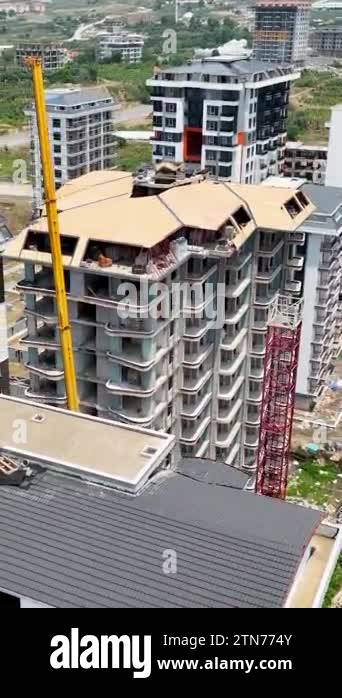 Capture the dynamic progress of building construction in this vertical ...