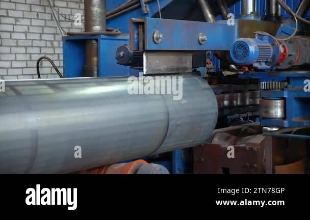 Pipe manufacturing plant. Pipe plant. Iron pipe welding. Pipe expansion ...