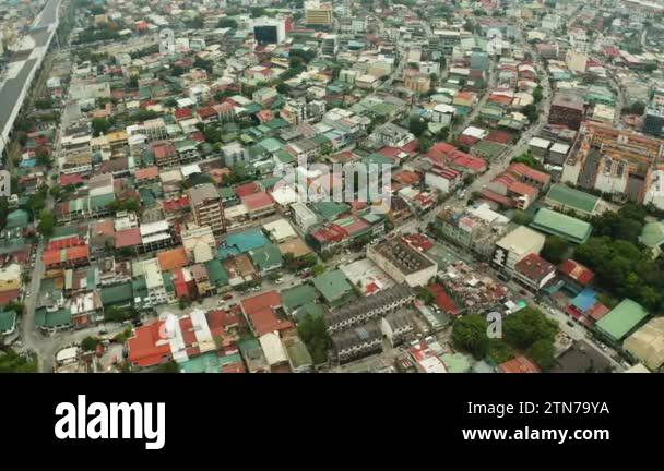 Streets and houses with dense buildings in the city of Manila ...
