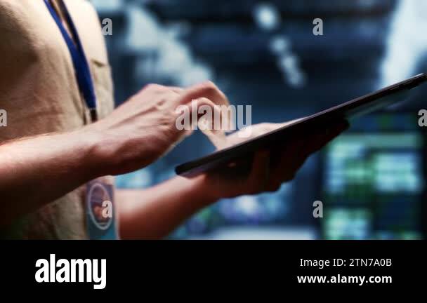 System Administrator Checking Energy Efficient Supercomputers Using Renewable Sources To