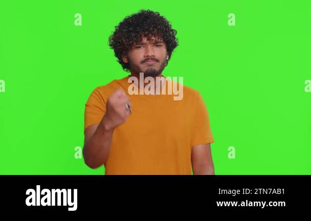 Greedy avaricious indian man showing fig negative gesture, you dont get ...