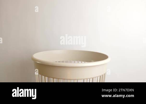 The old cap is recycled and thrown into the trash. The concept of waste ...