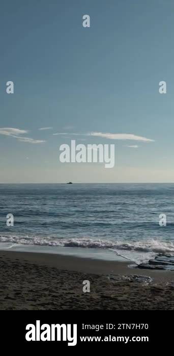 Witness the efficient operation of a sea tugboat as it navigates back ...