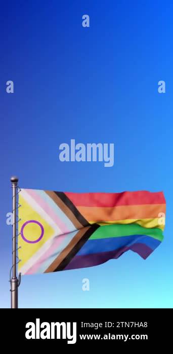 LGBTQ Pride banner waving in the blue sky. Pride month theme vertical ...