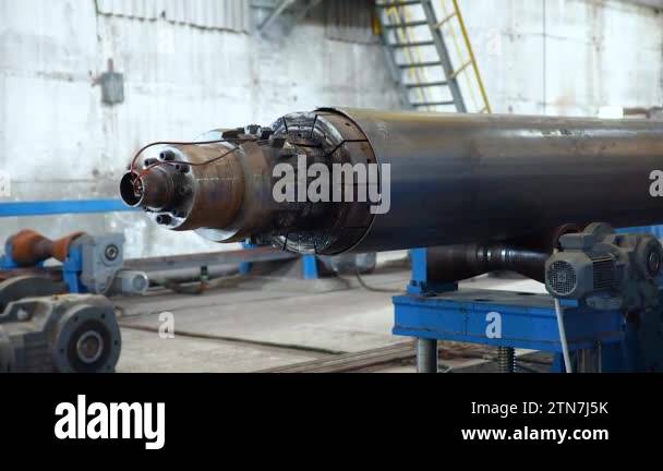 Pipe manufacturing plant. Pipe plant. Iron pipe welding. Pipe expansion ...