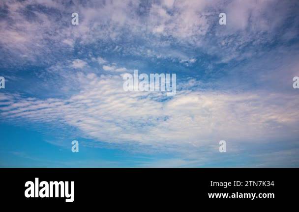 Time Lapse beautiful white clouds moving in blue sky.The clouds were ...