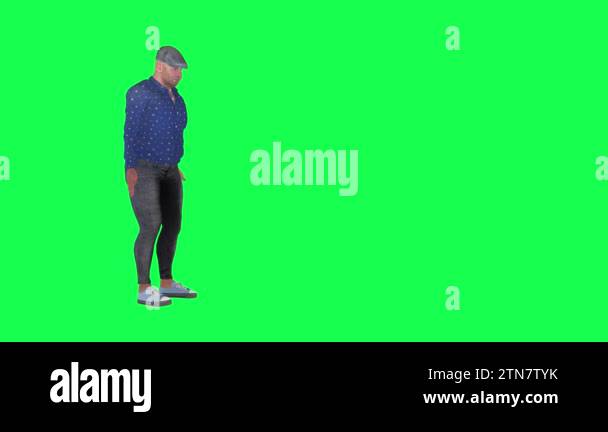 English man opening the door and entering from left view in green ...