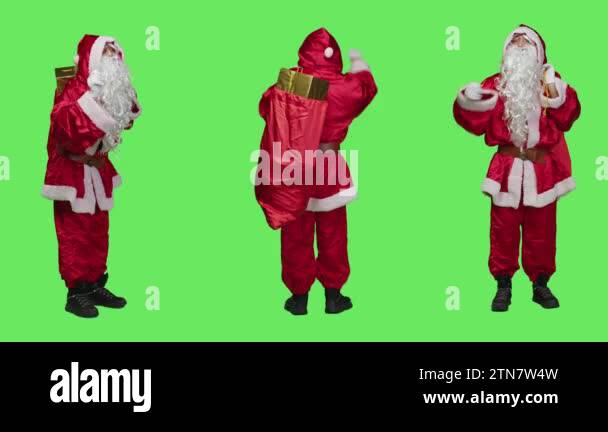 Santa choirmaster chief in red suit accompany professional orchestra as ...