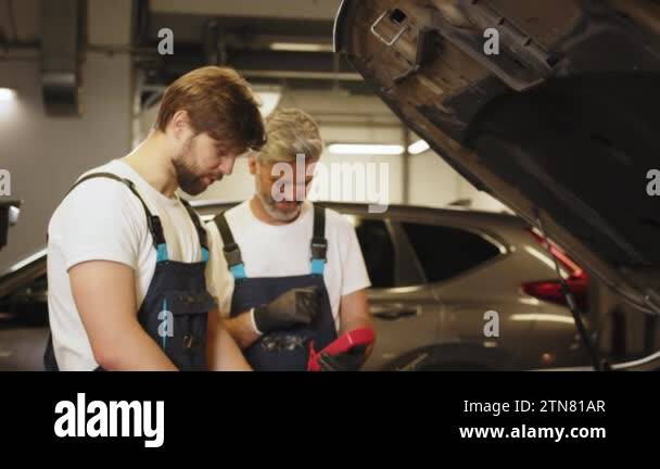Father son mechanics Stock Videos & Footage - HD and 4K Video Clips - Alamy