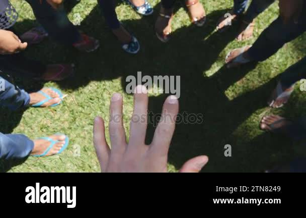 Arm of all races and colors stacked together one by one in unity and ...