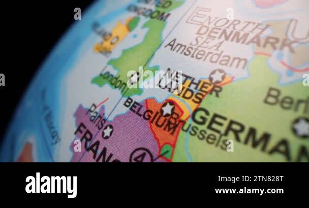 The globe with a map of Europe is slowly spinning, a close-up ...