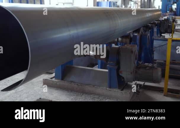 Pipe manufacturing plant. Pipe plant. Iron pipe welding. Pipe expansion ...