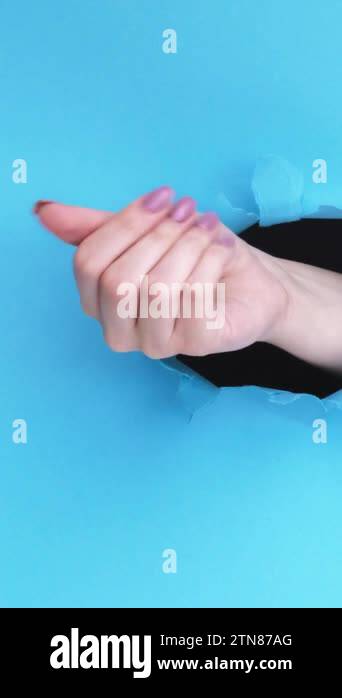 Vertical video. Money gesture. Pay sign. Female hand asking for cash ...