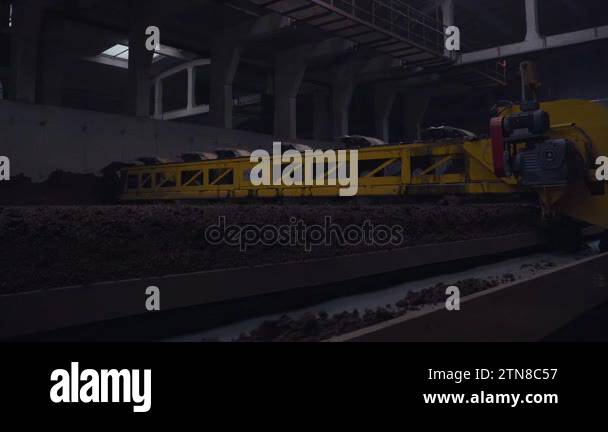 Industrial belt conveyor. Moving Raw Materials. Long conveyor belt ...
