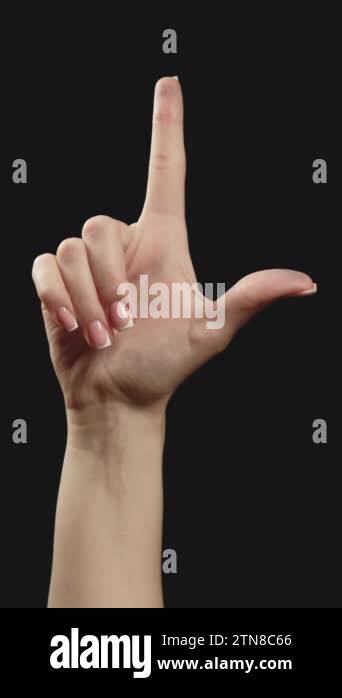 Vertical video. Advertising hand. Attention gesture. Woman pointing ...