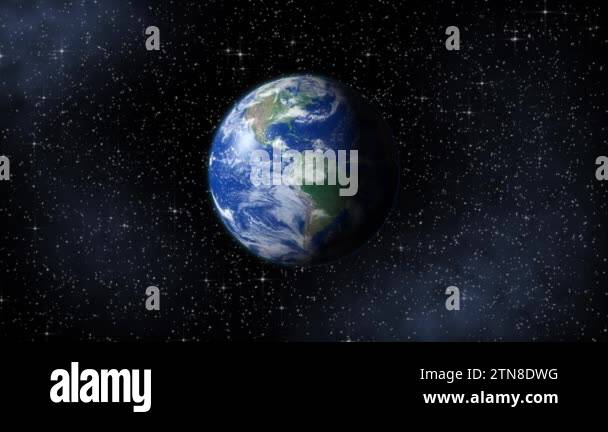 Planet Earth revolving against a background of stars. City lights can ...