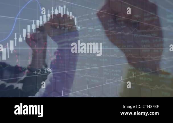 Animation of graphs with numbers and trading board over raised fists of ...