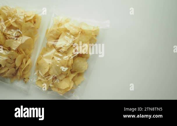 Packets of potato chips Stock Videos & Footage - HD and 4K Video Clips ...