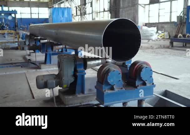 Pipe manufacturing plant. Pipe plant. Iron pipe welding. Pipe expansion ...
