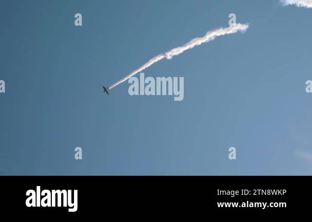 Private plane crash. A small plane during an aerobatic simulation ...