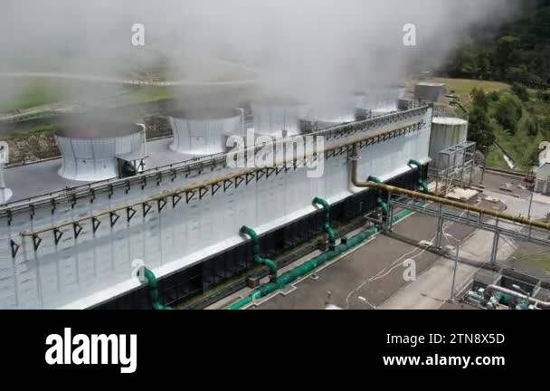 Thermal power plant on a volcano in the middle of the jungle, steam ...