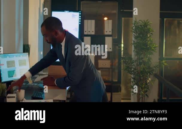 Sad businessman getting consoled by colleague during last office ...