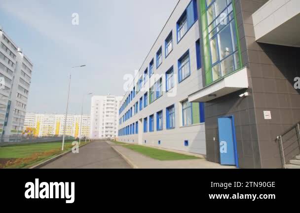 Contemporary school building with color facade in dwelling block of ...
