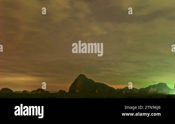 Time lapse amazing night view of nature at night.clouds stars and milky ...