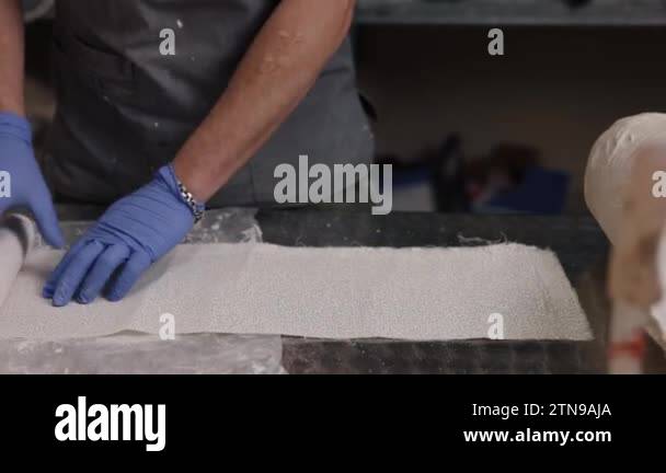 Mold development, Plaster modeling, Workspace solutions. Man fabricates ...