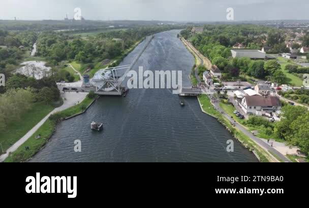 Pegasus Bridge, world war 2 landmark. Aerial drone view. Road crossing ...