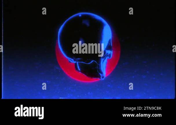 A spinning skull created in an old 80s VHS retro video opener style ...