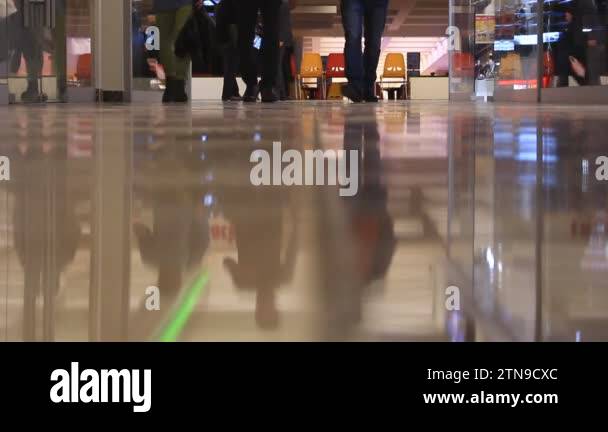 Close-up feet walking people in the mall Stock Video Footage - Alamy