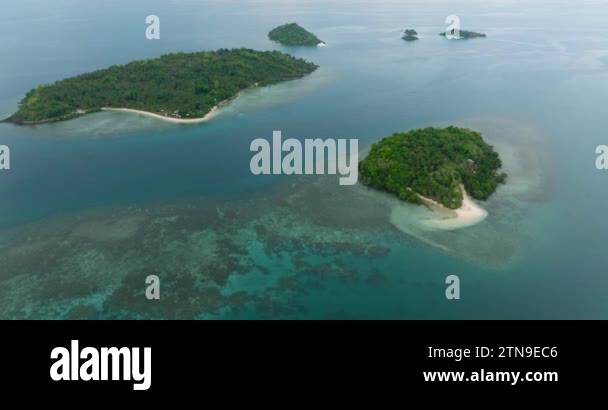 Tropical Islands with turquoise water atoll and corals. Once Islas in ...