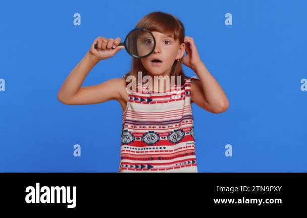 Investigator researcher scientist young school girl holding magnifying ...