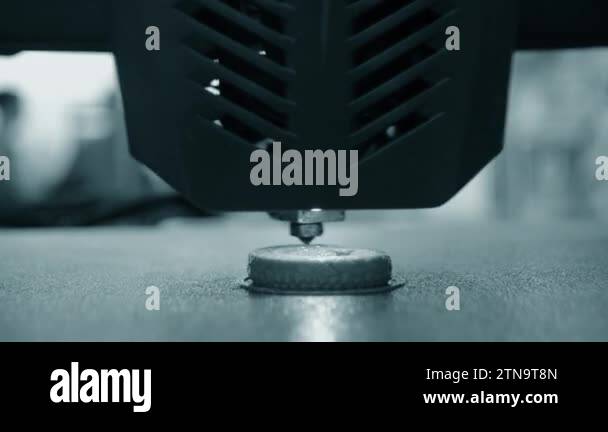3D printer. 3D printer printing process close-up. 3D printer creating ...