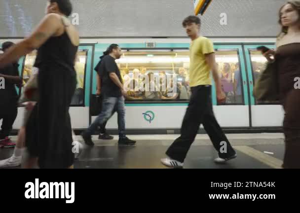 Paris, France. June 25 2023. People board crowded trains in metro ...