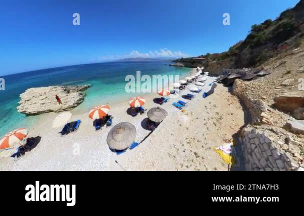 Saranda, Albania - June 6, 2023: drone view of Pulebardha Beach is a great option for a quiet ...