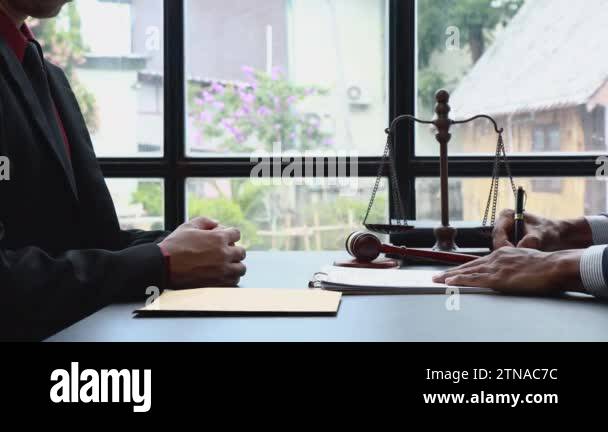 Lawyer, legal advisor, businessman explaining agreement details ...