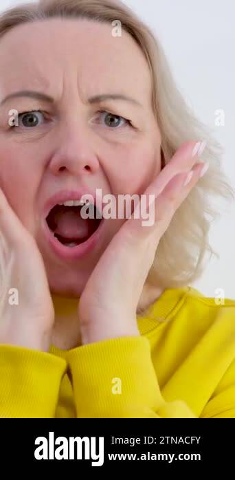Attractive girl depict shock in camera on white background. woman ...