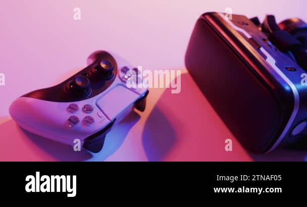 Video of close up of video game pad controller and vr headset with copy ...