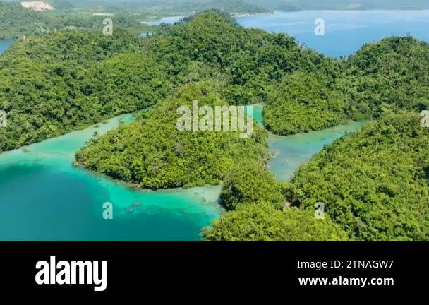 Beautiful lagoons with beach coast and coral reefs. Tropical islands ...