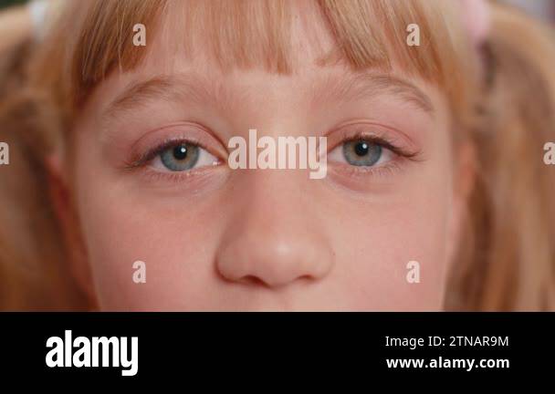 Extreme close-up macro portrait of smiling girl face. Teen beautiful ...