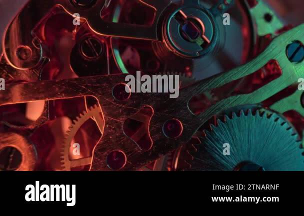 Old vintage analog clock gears and cogs mechanism watch. Macro internal ...