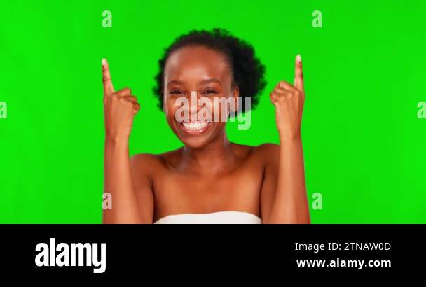 Green screen, face and black woman with beauty, pointing up and ...
