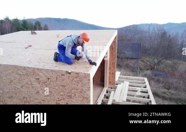 Man building on top house Stock Videos & Footage - HD and 4K Video ...