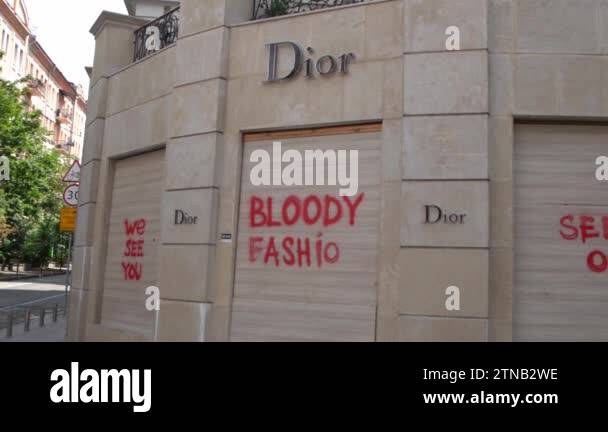 Signboard logo of the company DIOR on the store. Bloody fashion the ...