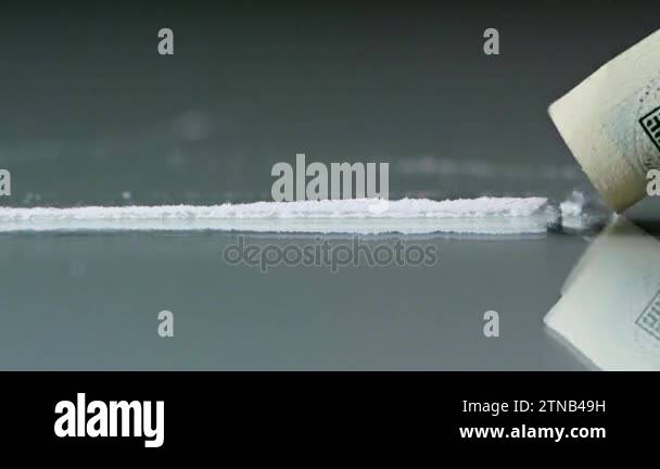 Rolled Banknote Snorting a Line of Cocaine Powder Stock Video Footage ...