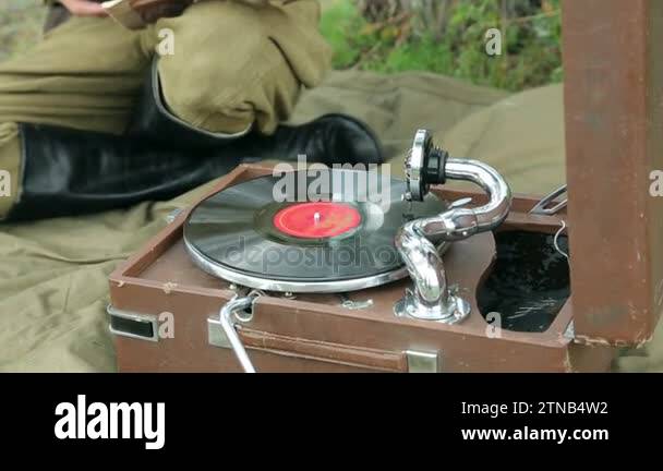 The army of the USSR. Soviet army soldiers are resting. Soldiers listen ...