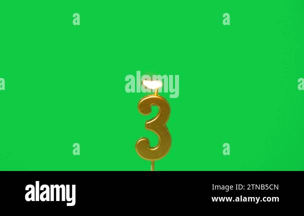 seamless looping candle light, golden candle number three shape for ...