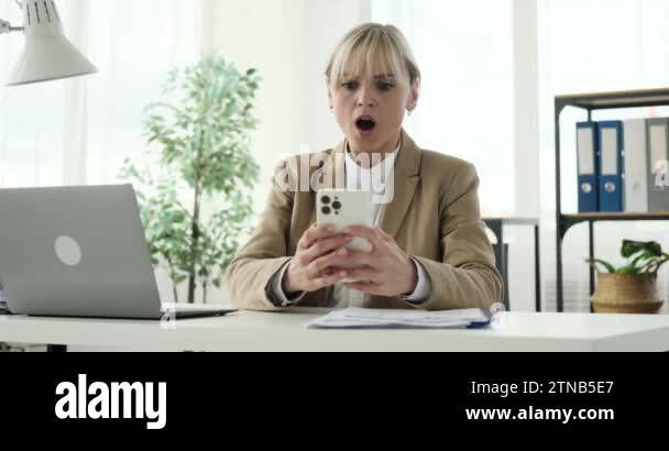 Woman at her workplace becomes visibly upset and disappointed after ...